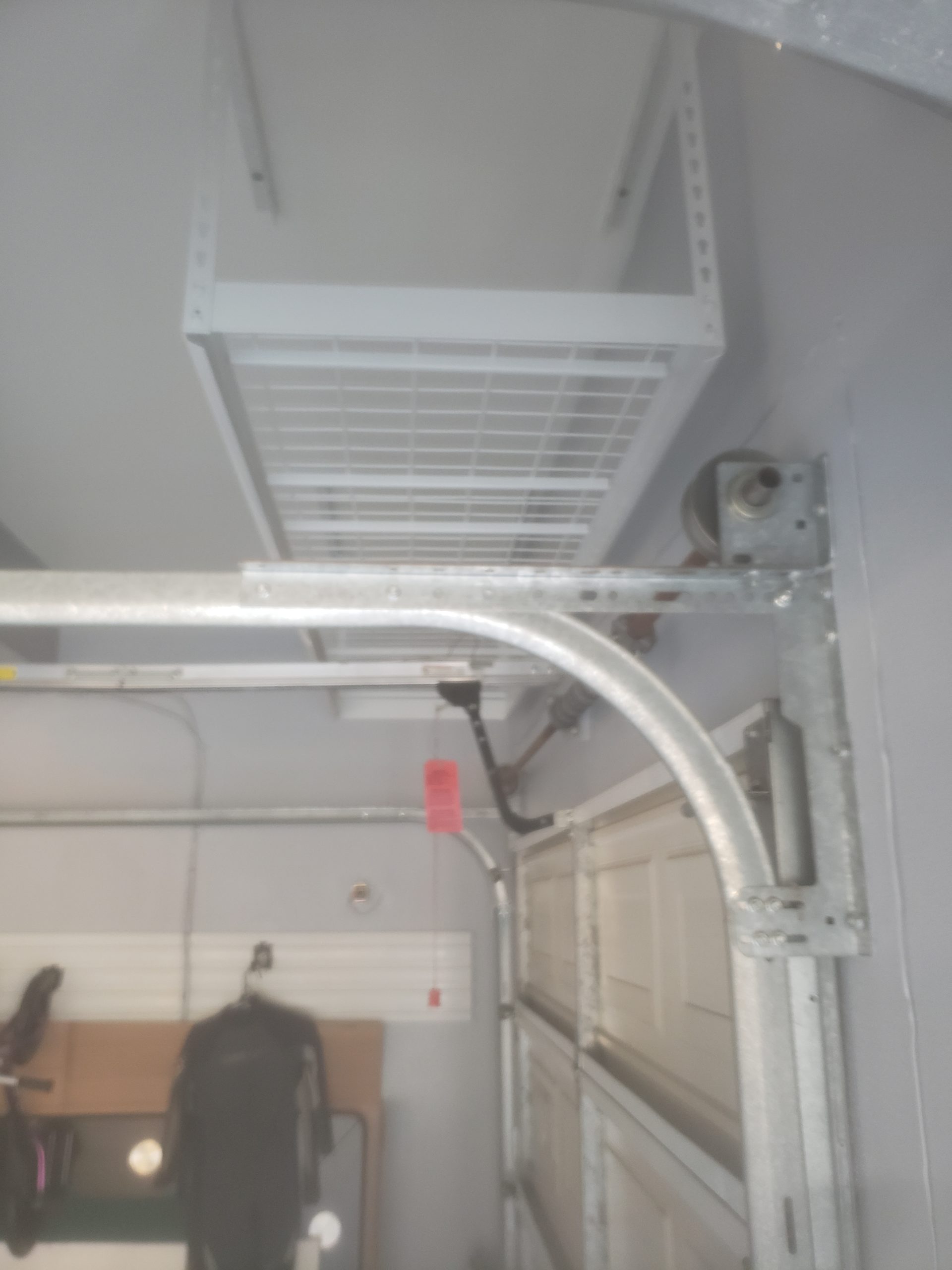 Overhead Metal Shelving In The Garage | Go Joe Handyman